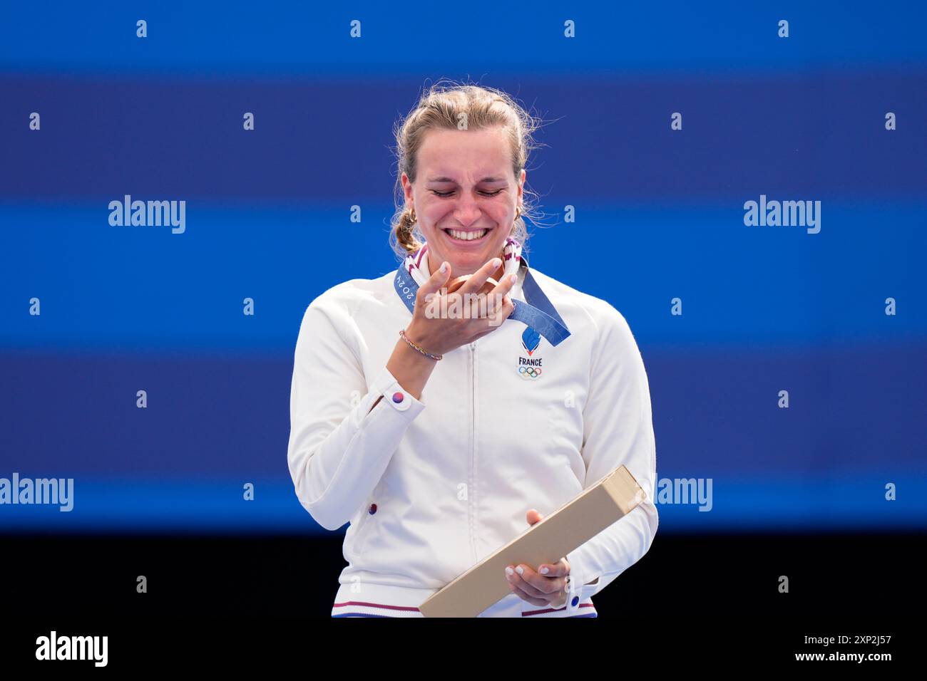 France's Lisa Barbelin stands on the podium while receiving the women's ...