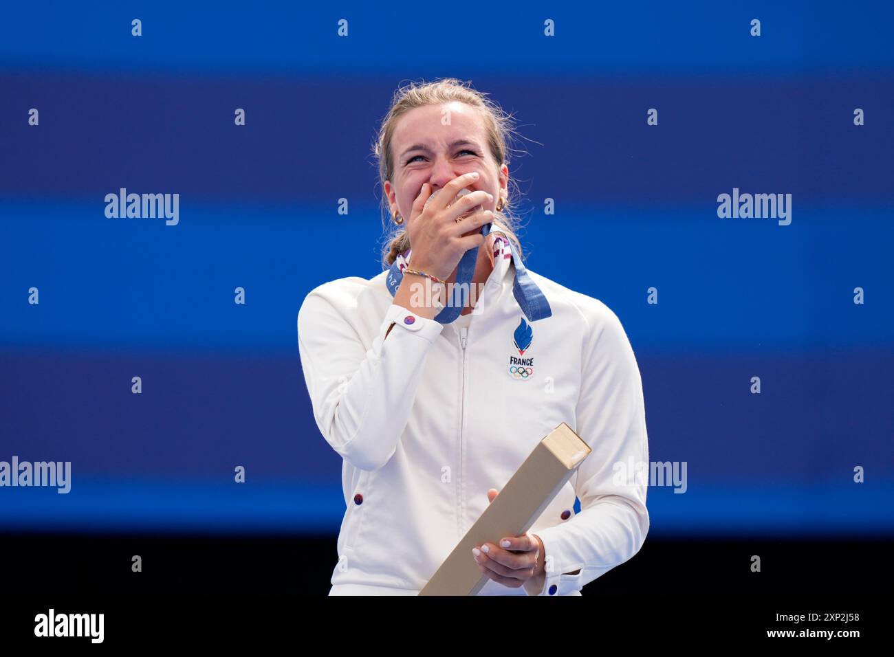France's Lisa Barbelin stands on the podium while receiving the women's ...