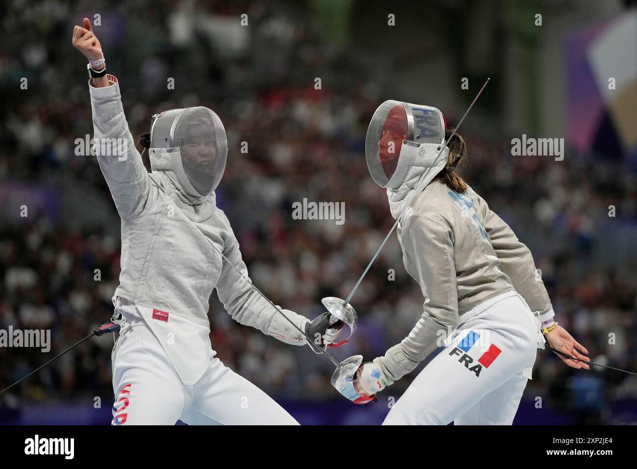 South Korea's Choi Sebin, left, competes with France's Sara Balzer in ...
