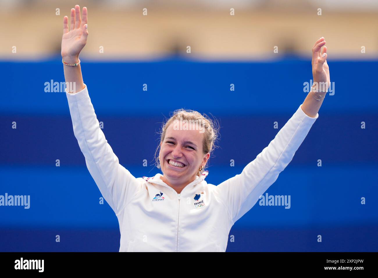 France's Lisa Barbelin stands on the podium to receive the women's ...