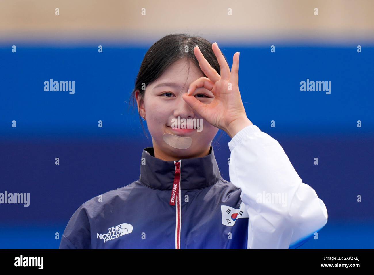 South Korea's Lim Si-hyeon gestures while standing on the podium to ...