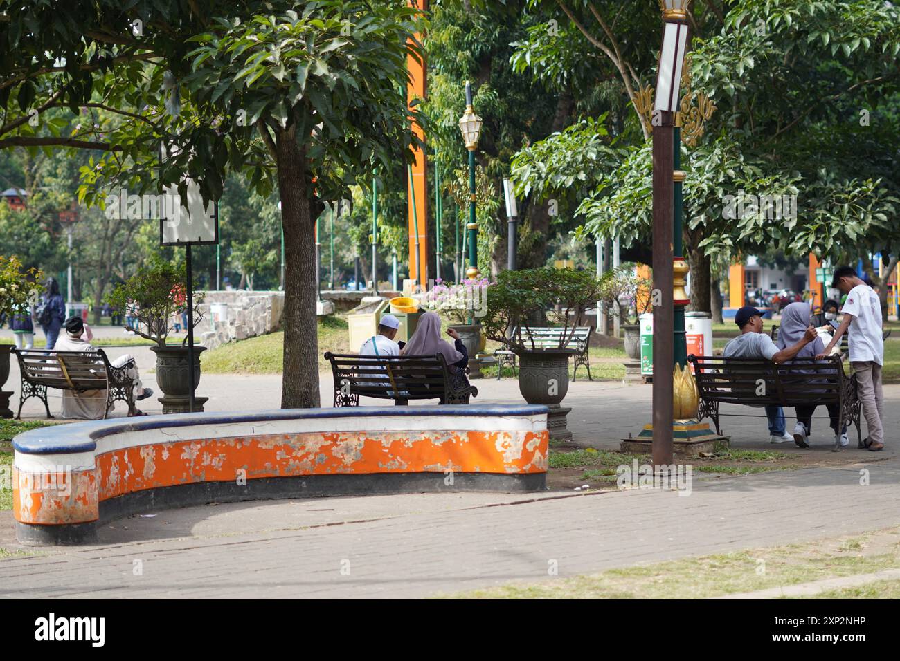 The park in the busy town square of Malang in the morning Stock Photo ...