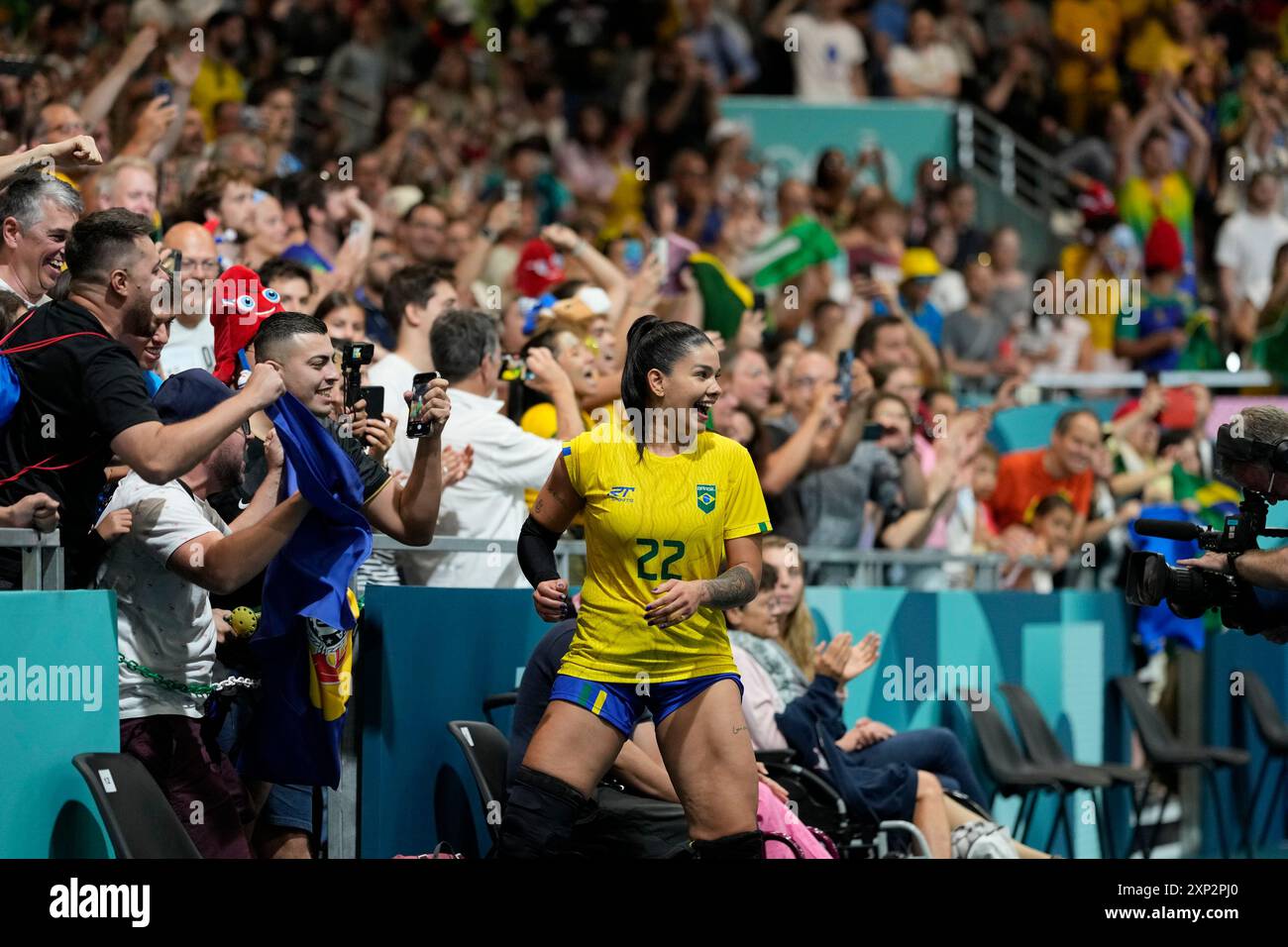Samara Vieira, of Brazil, interacts with teh crowd after winning ...