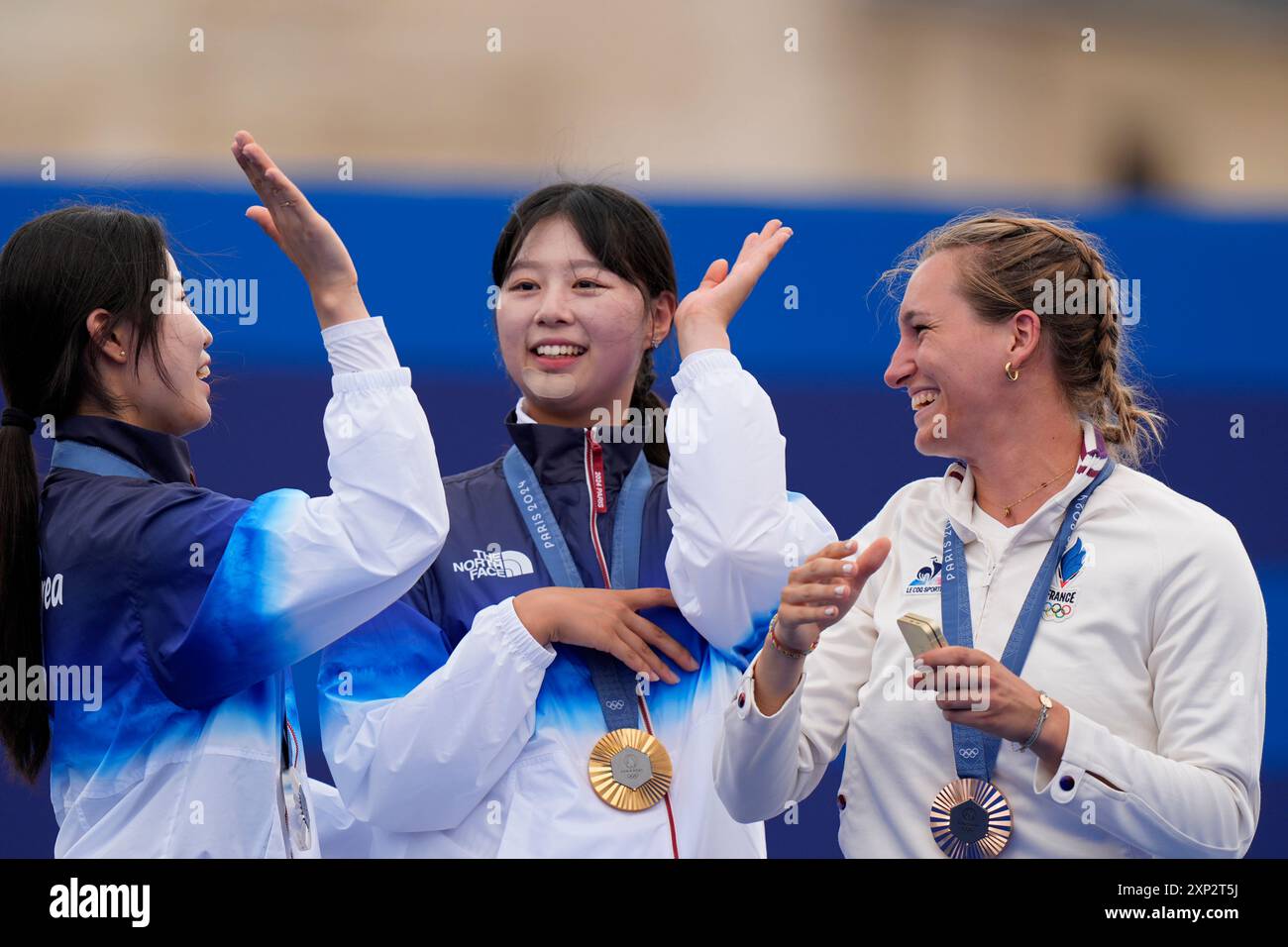 South Korea's Lim Si-hyeon, center, stands on the podium with the women ...