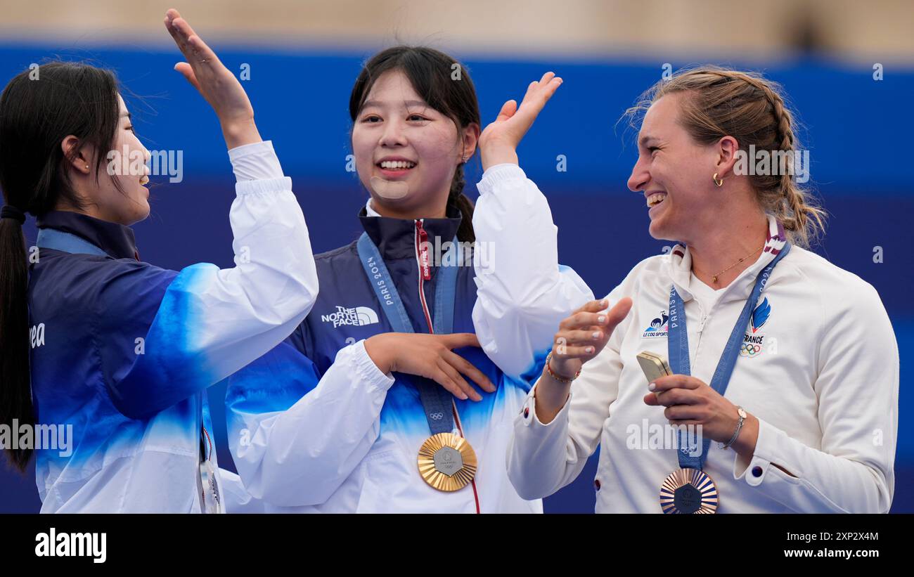 South Korea's Lim Si-hyeon, center, stands on the podium with the women ...