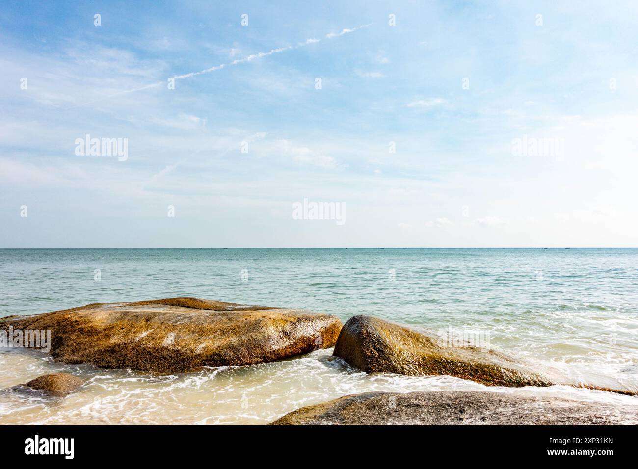 View of Tanjing Tokong beach in Penang, Malaysia, a tropical scene with ...