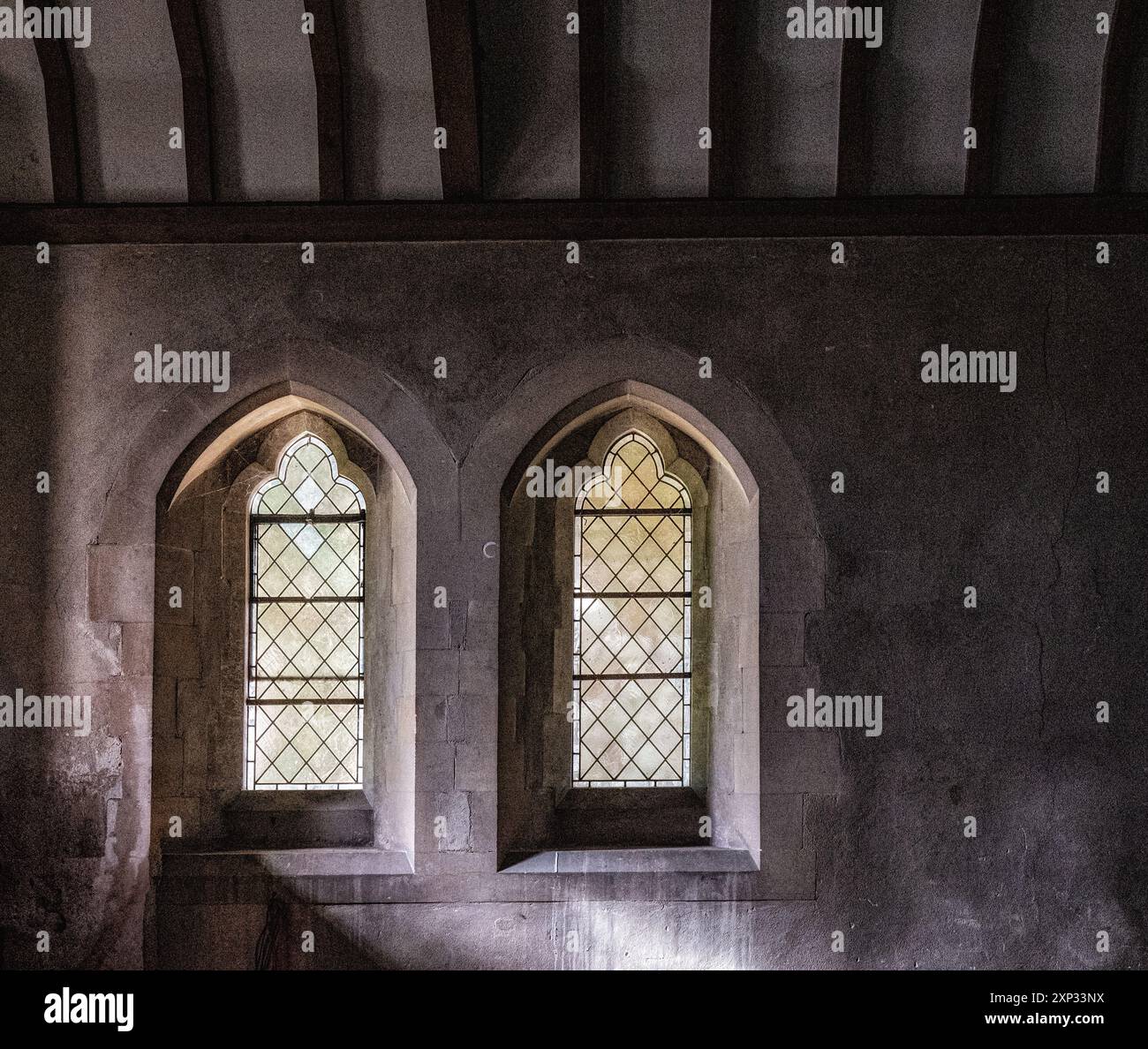 Church windows with clear glass taken from the dark interior of the ...