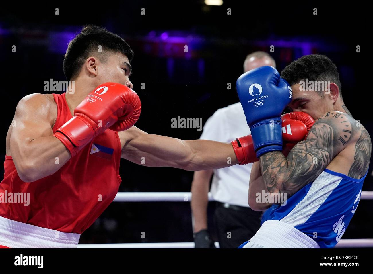 Philippines' Carlo Paalam, left, fights Australia's Charlie Senior in ...