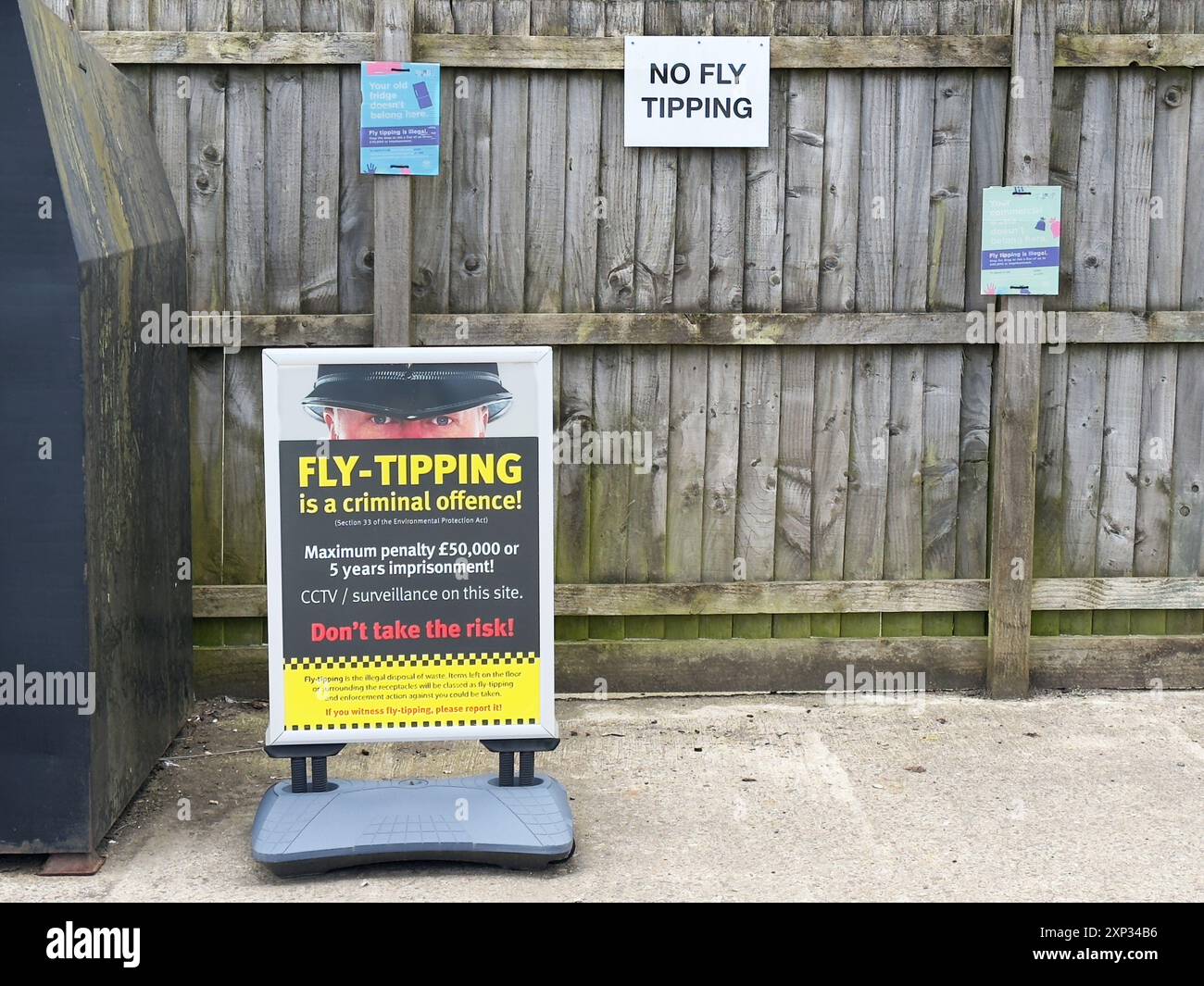 No fly tipping of rubbish sign at public bin collection area Stock ...