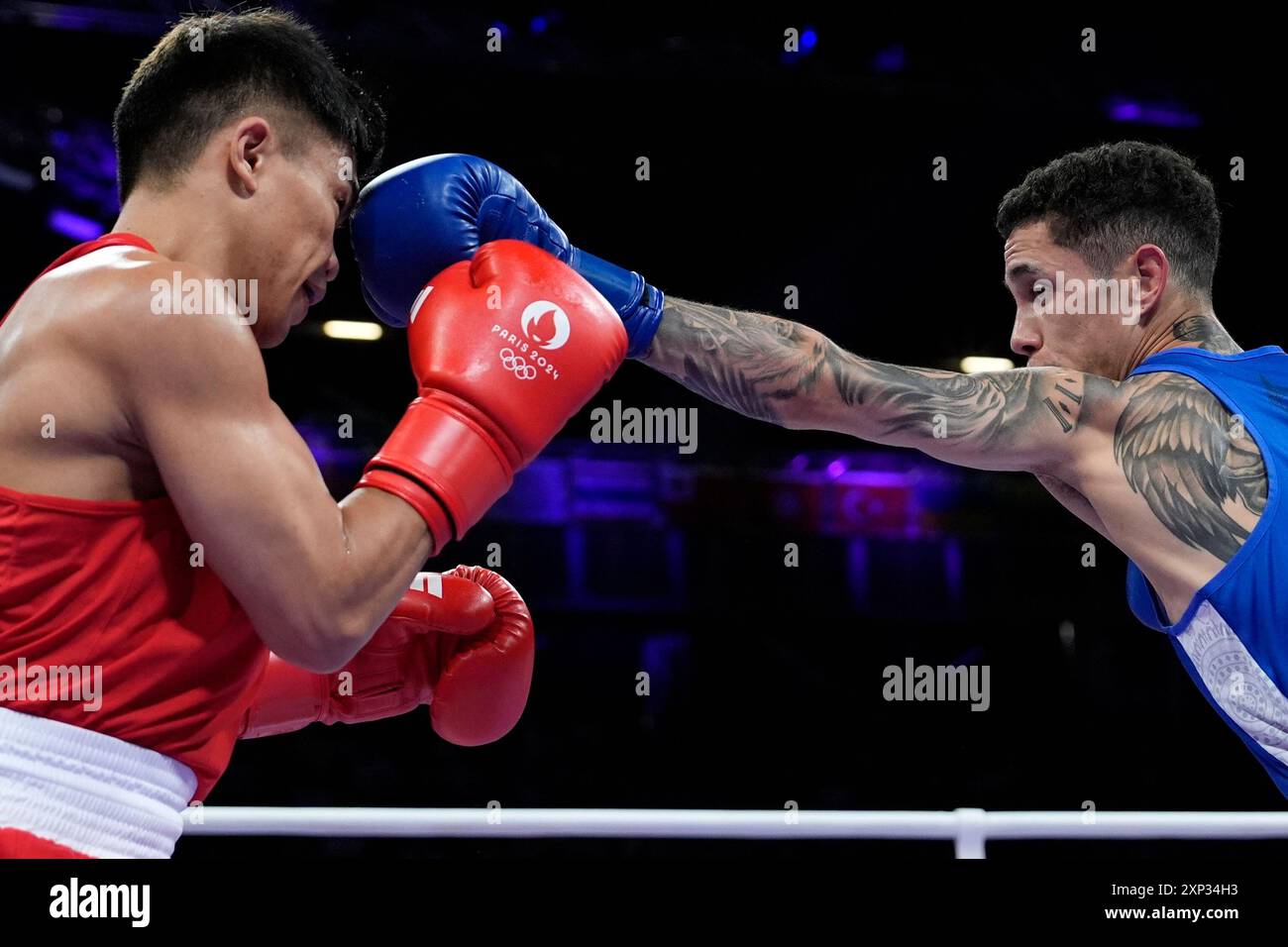 Philippines' Carlo Paalam, left, fights Australia's Charlie Senior in ...
