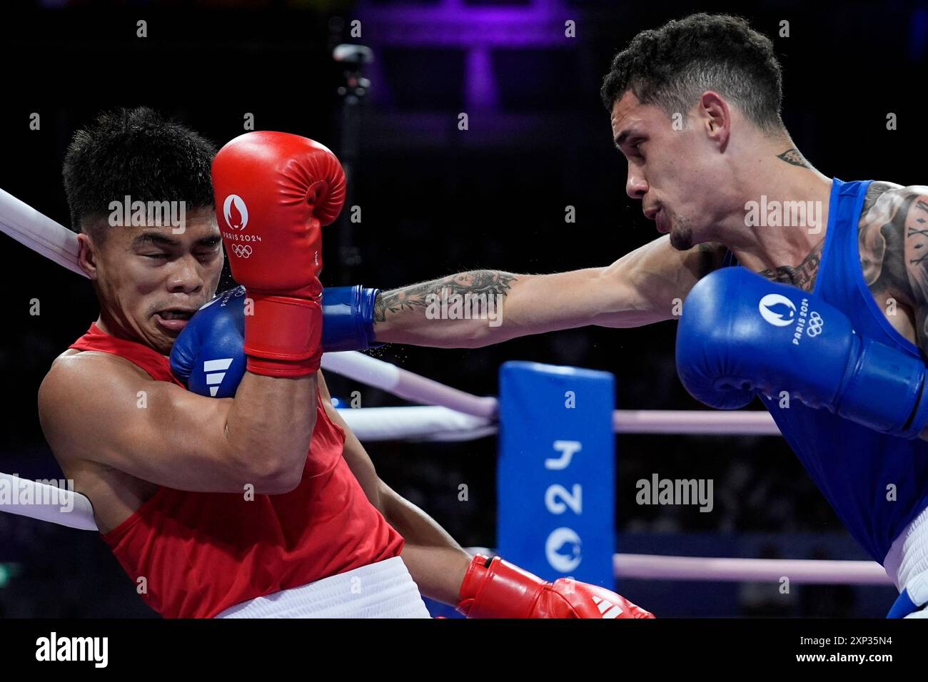 Philippines' Carlo Paalam, left, fights Australia's Charlie Senior in ...