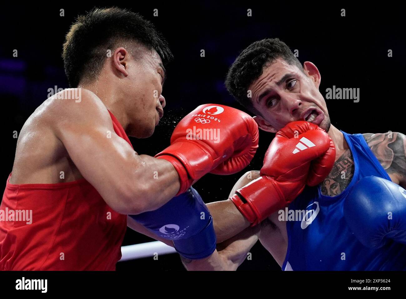Philippines' Carlo Paalam, left, fights Australia's Charlie Senior in ...