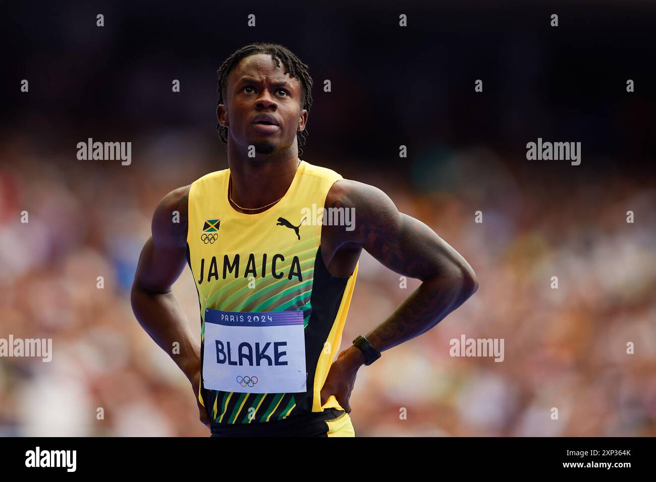 Ackeem Blake of Team Jamaica looks during the Men's 100m Round 1 on day ...