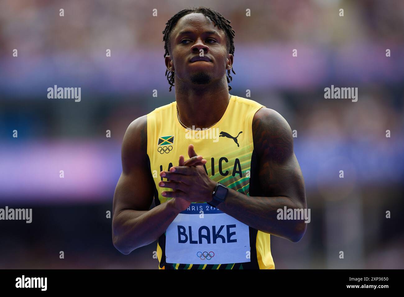 Ackeem Blake of Team Jamaica reacts during the Men's 100m Round 1 on ...