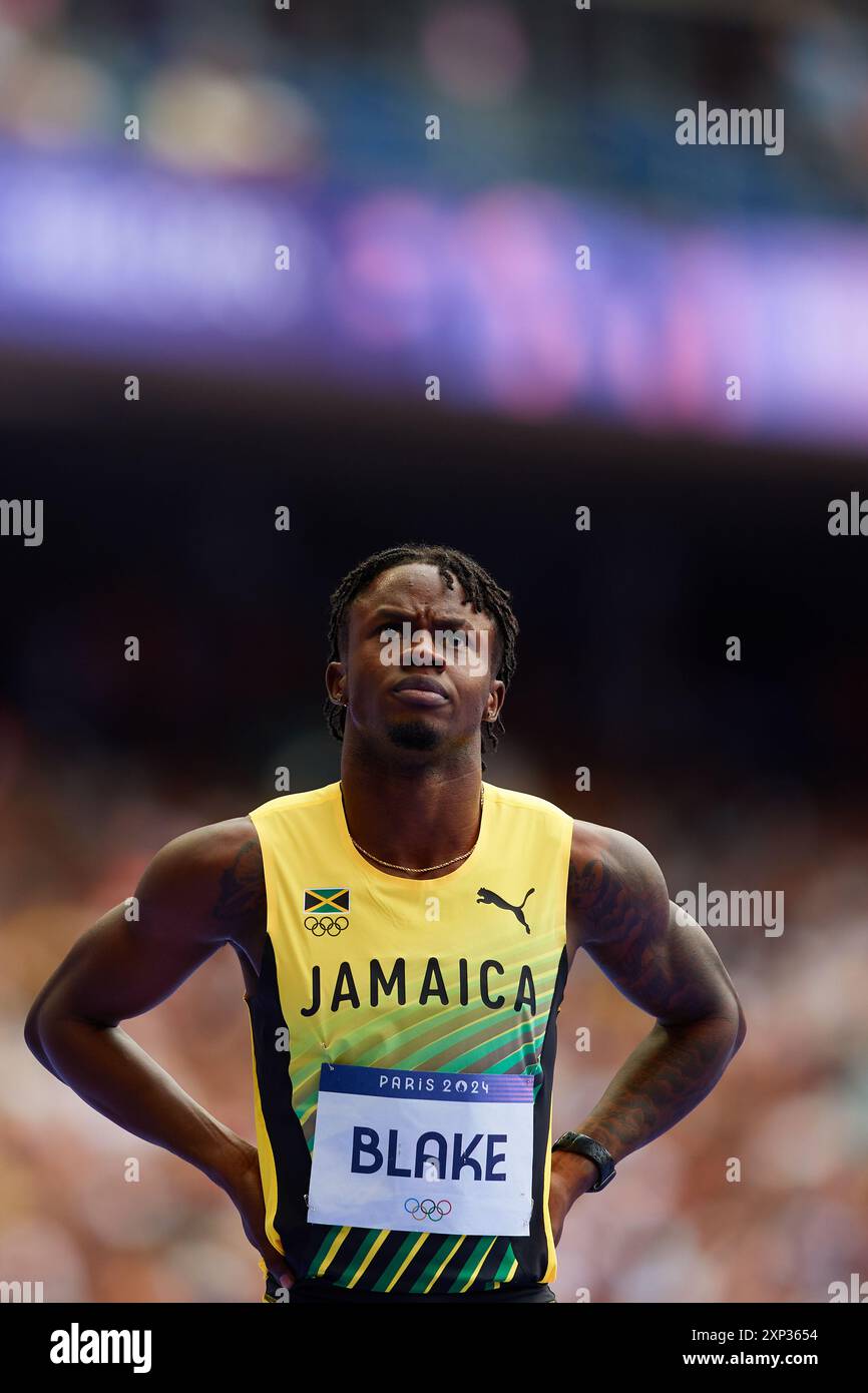 Ackeem Blake of Team Jamaica looks during the Men's 100m Round 1 on day ...