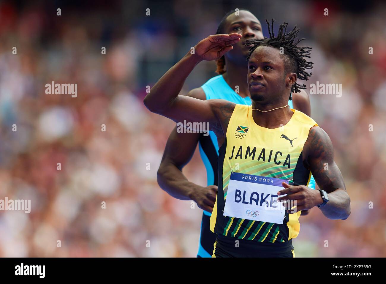Ackeem Blake of Team Jamaica reacts during the Men's 100m Round 1 on ...