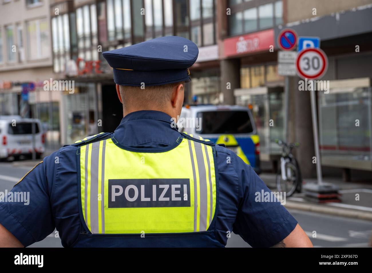 Augsburg, Bavaria, Germany - August 3, 2024: Bavarian police officer on ...