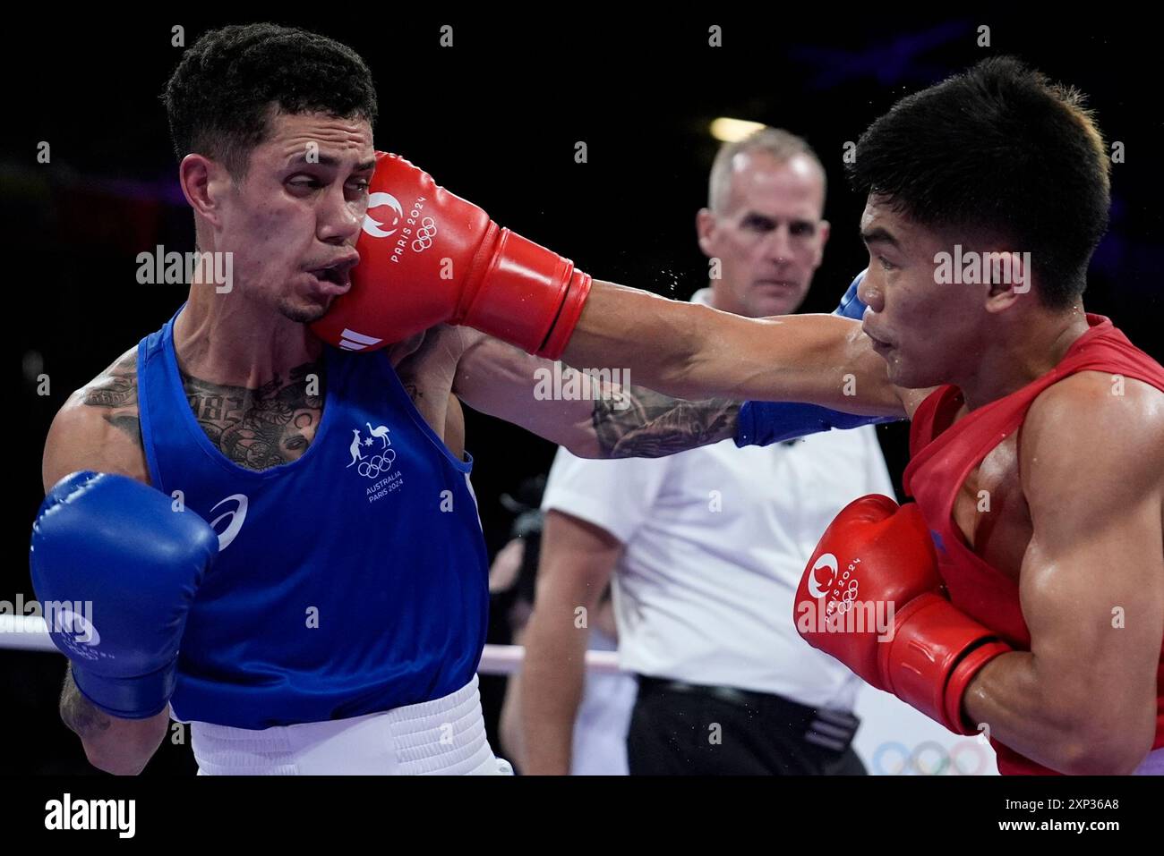 Philippines' Carlo Paalam, right, fights Australia's Charlie Senior in ...