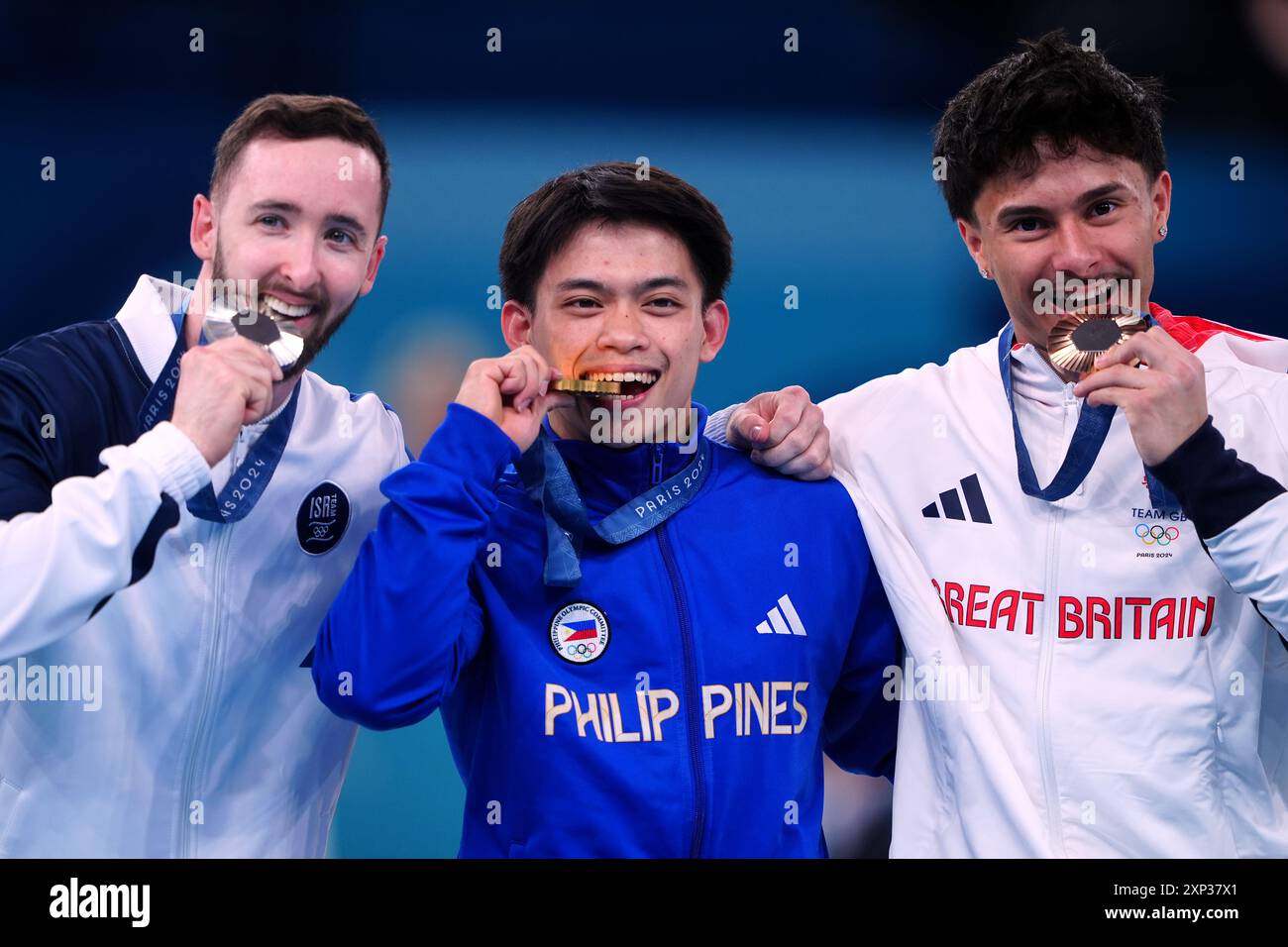 Great Britain's Jake Jarman (bronze), Philippines' Carlos Yulo (gold ...
