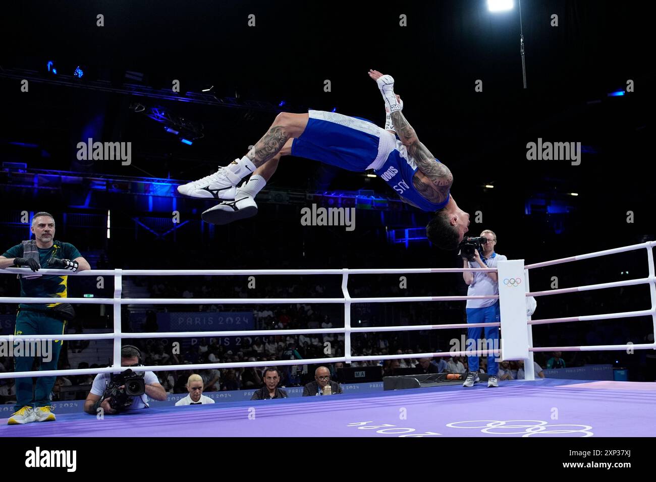 Australia's Charlie Senior, flips while celebrating after defeating ...