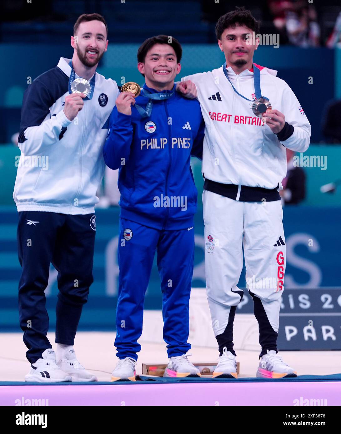 Great Britain's Jake Jarman (bronze), Philippines' Carlos Yulo (gold ...