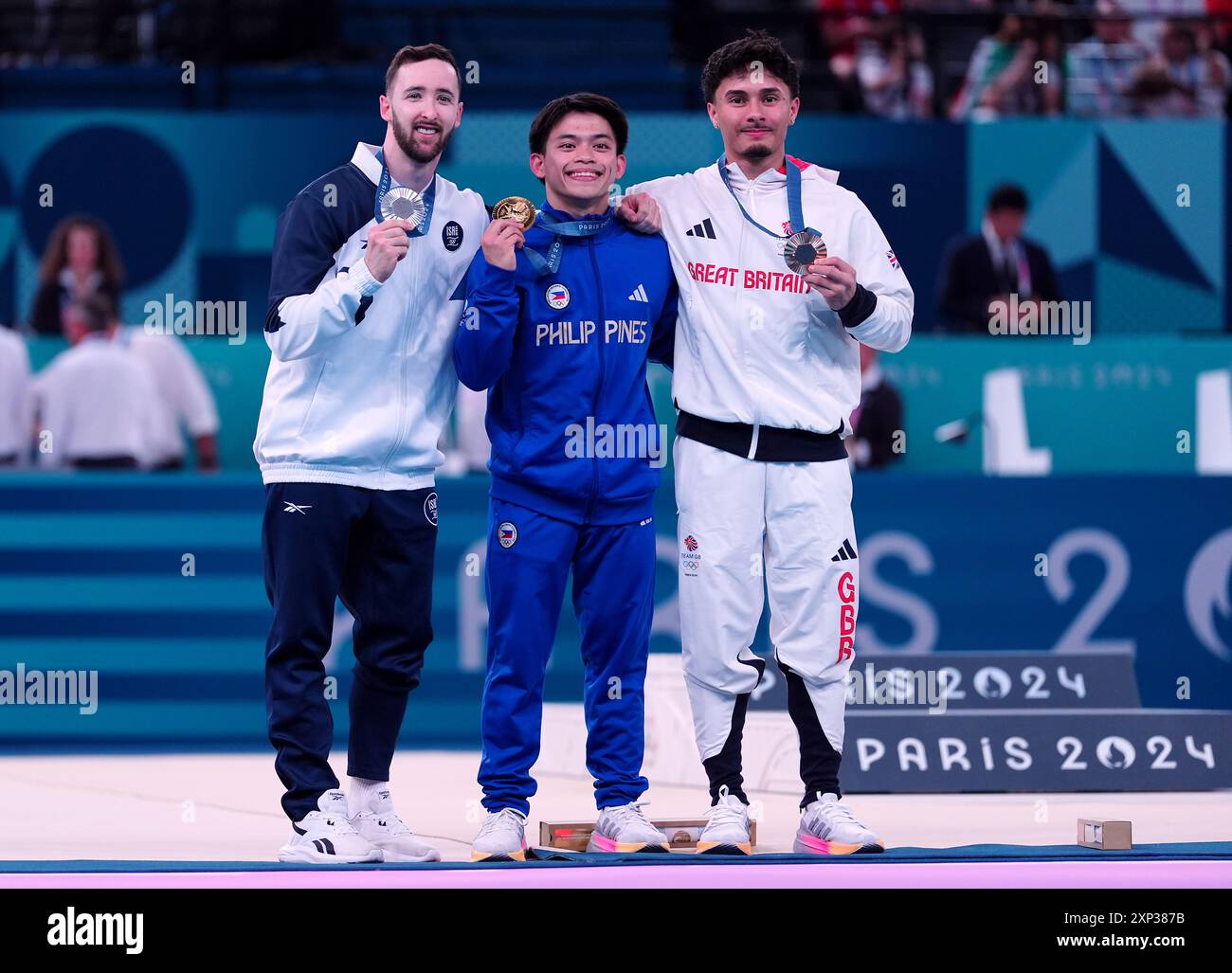 Great Britain's Jake Jarman (bronze), Philippines' Carlos Yulo (gold ...