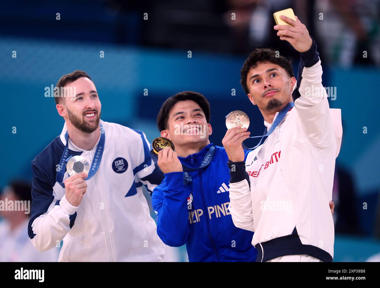 Great Britain's Jake Jarman (bronze), Philippines' Carlos Yulo (gold ...