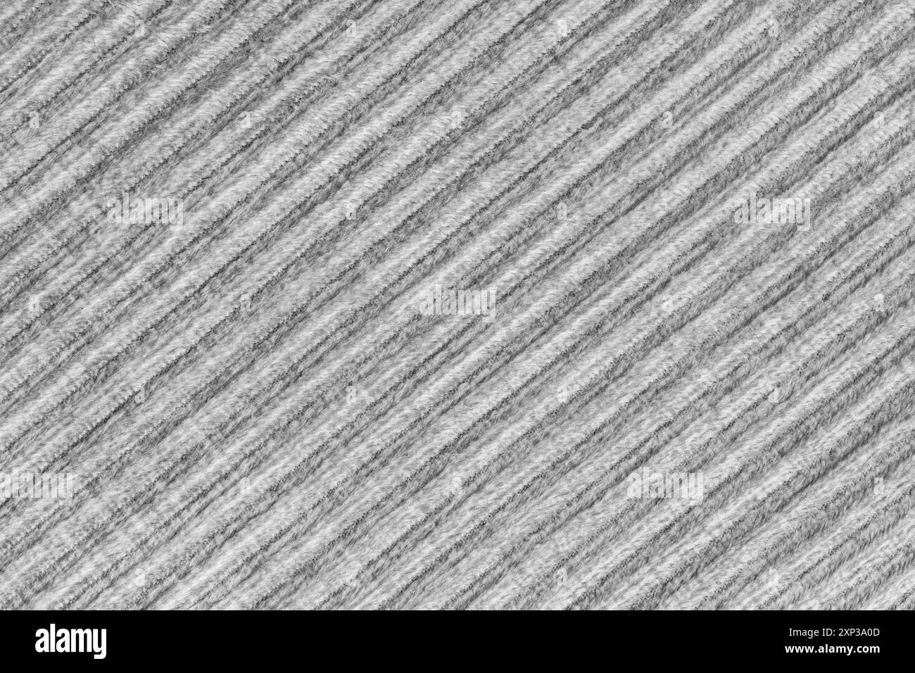 Ridge texture background of velour corduroy gray cloth. Large ribbed ...