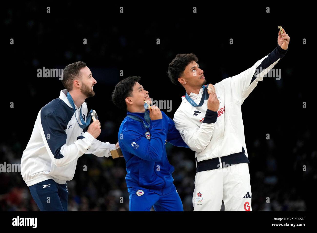 From left to right, silver medalist Artem Dolgopyat, of Israel, gold ...