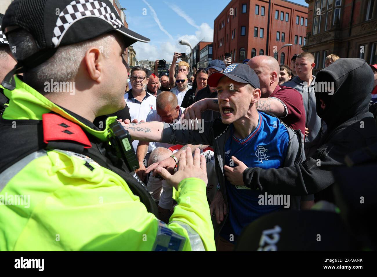 People protest in Blackpool, following the stabbing attacks on Monday ...