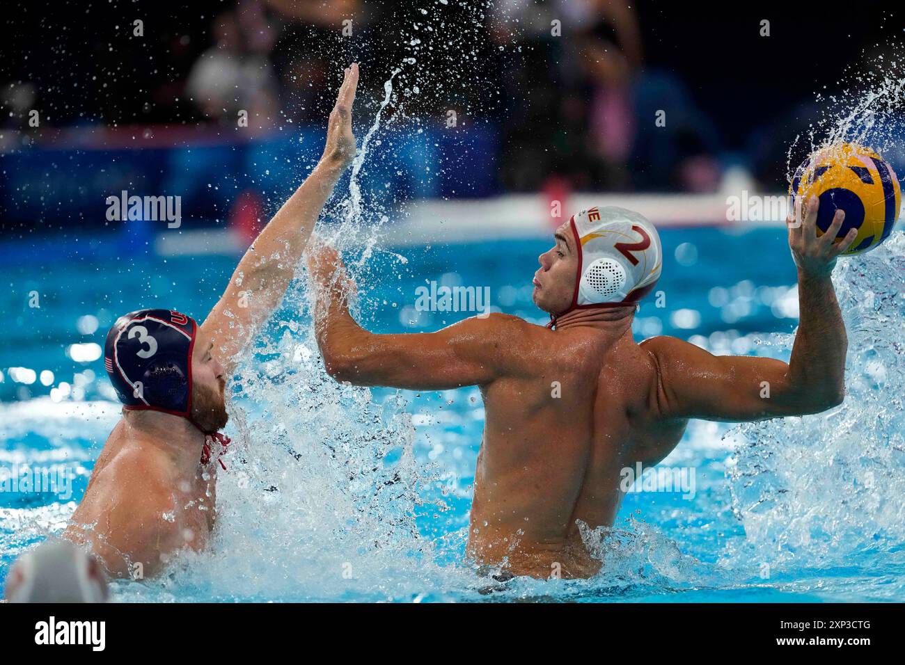 Montenegro's Marco Mrsic is defended by United States' Marko Vavic ...