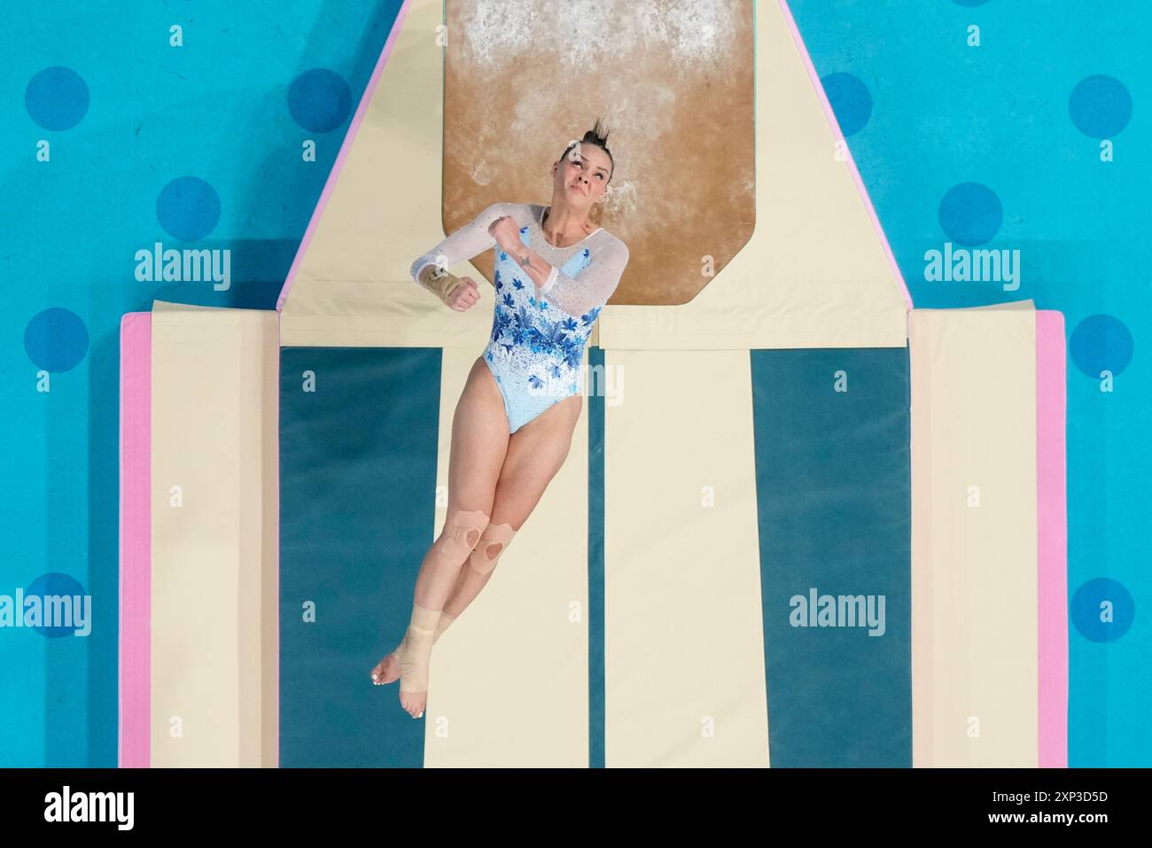 Shallon Olsen, of Canada, performs on the vault during the women's ...