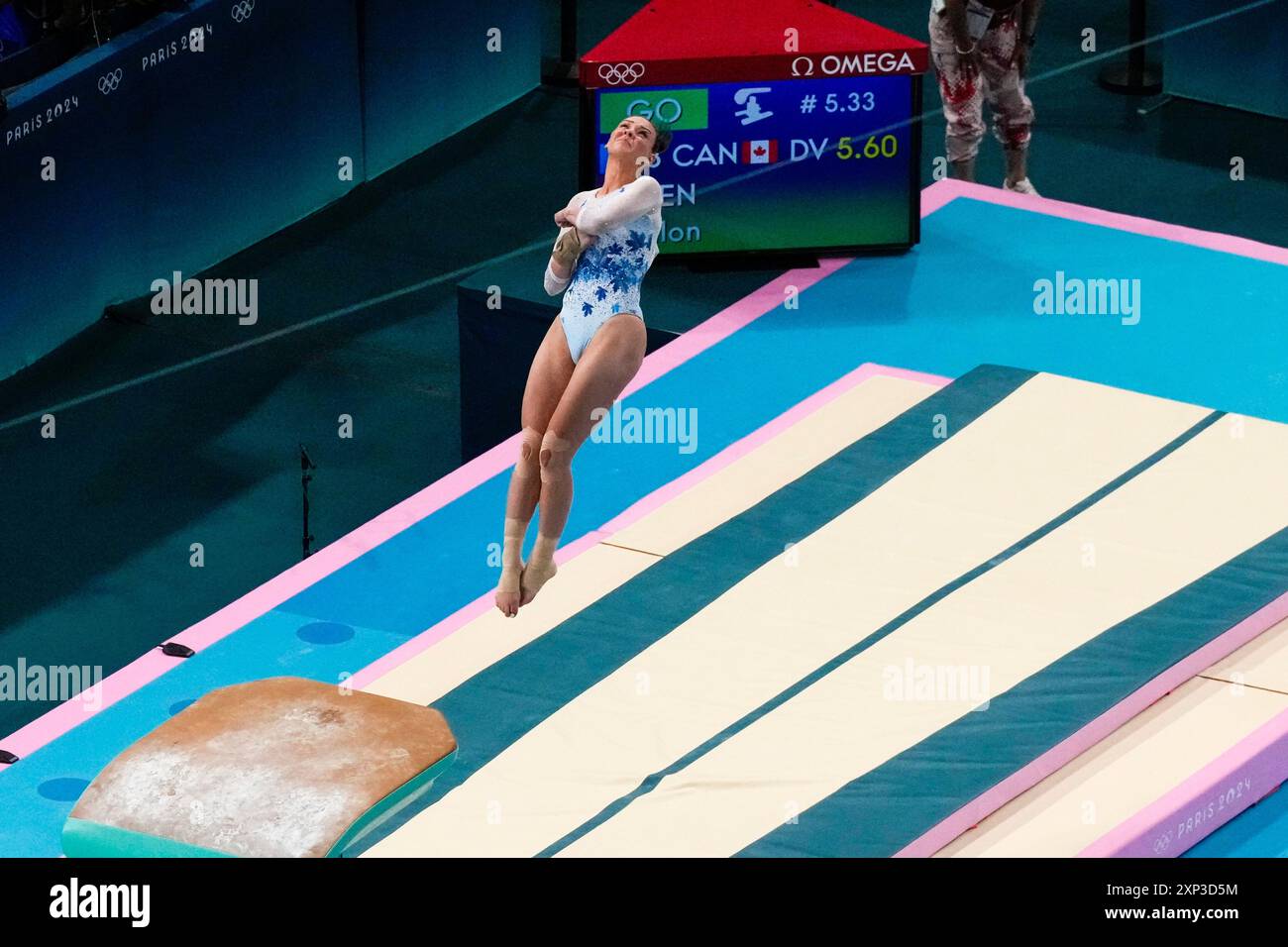 Shallon Olsen, of Canada, performs on the vault during the women's ...