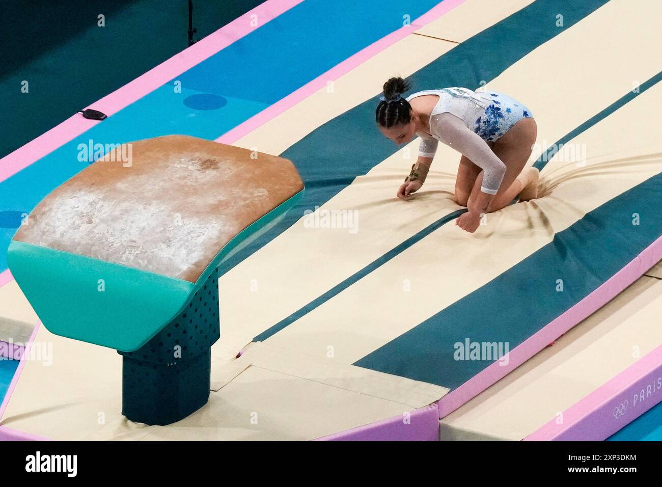 Shallon Olsen, of Canada, performs on the vault during the women's ...