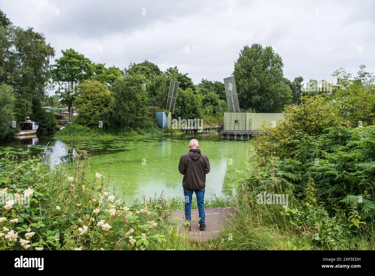 Antrim, Northern Ireland - August 3rd 2024: Man looks across Six ...
