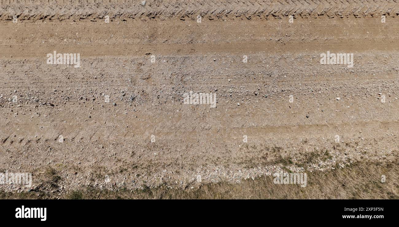 view from above on texture gravel road with median with lawn Stock ...