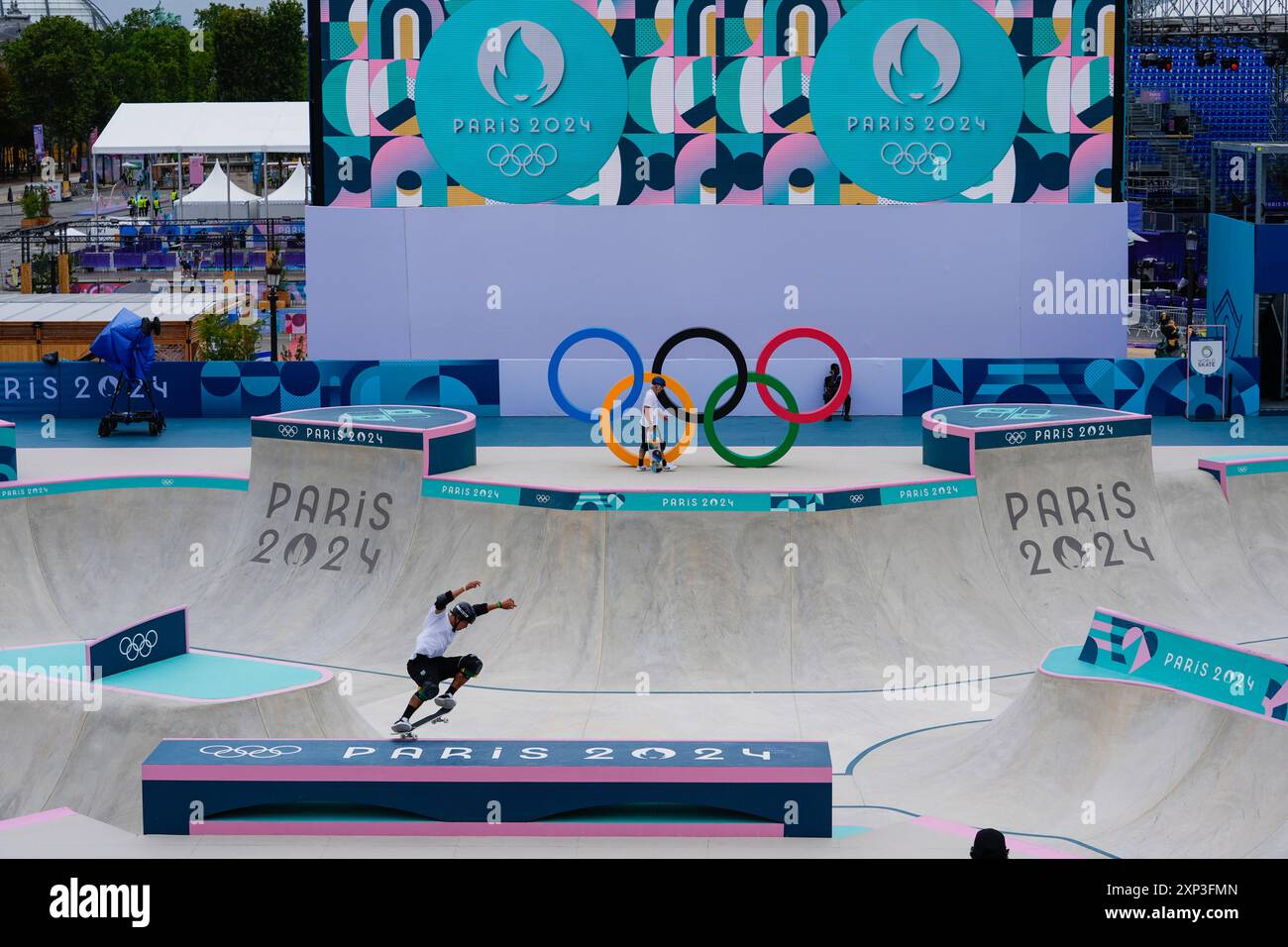 Competitors perform during the men's skateboard park practice session ...