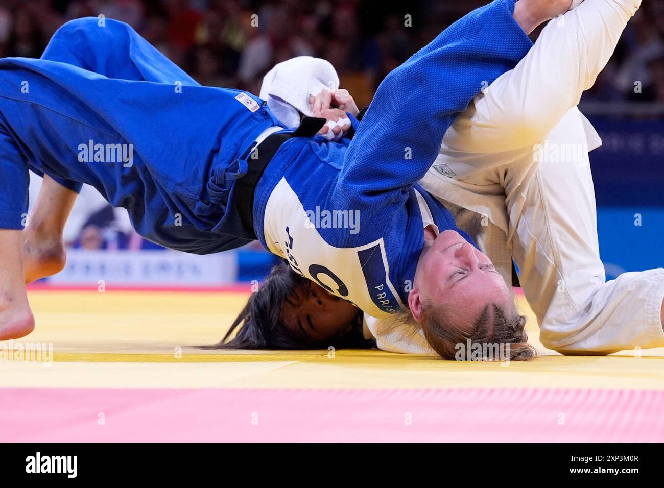 South Korea's Mimi Huh and Germany's Pauline Starke compete during ...