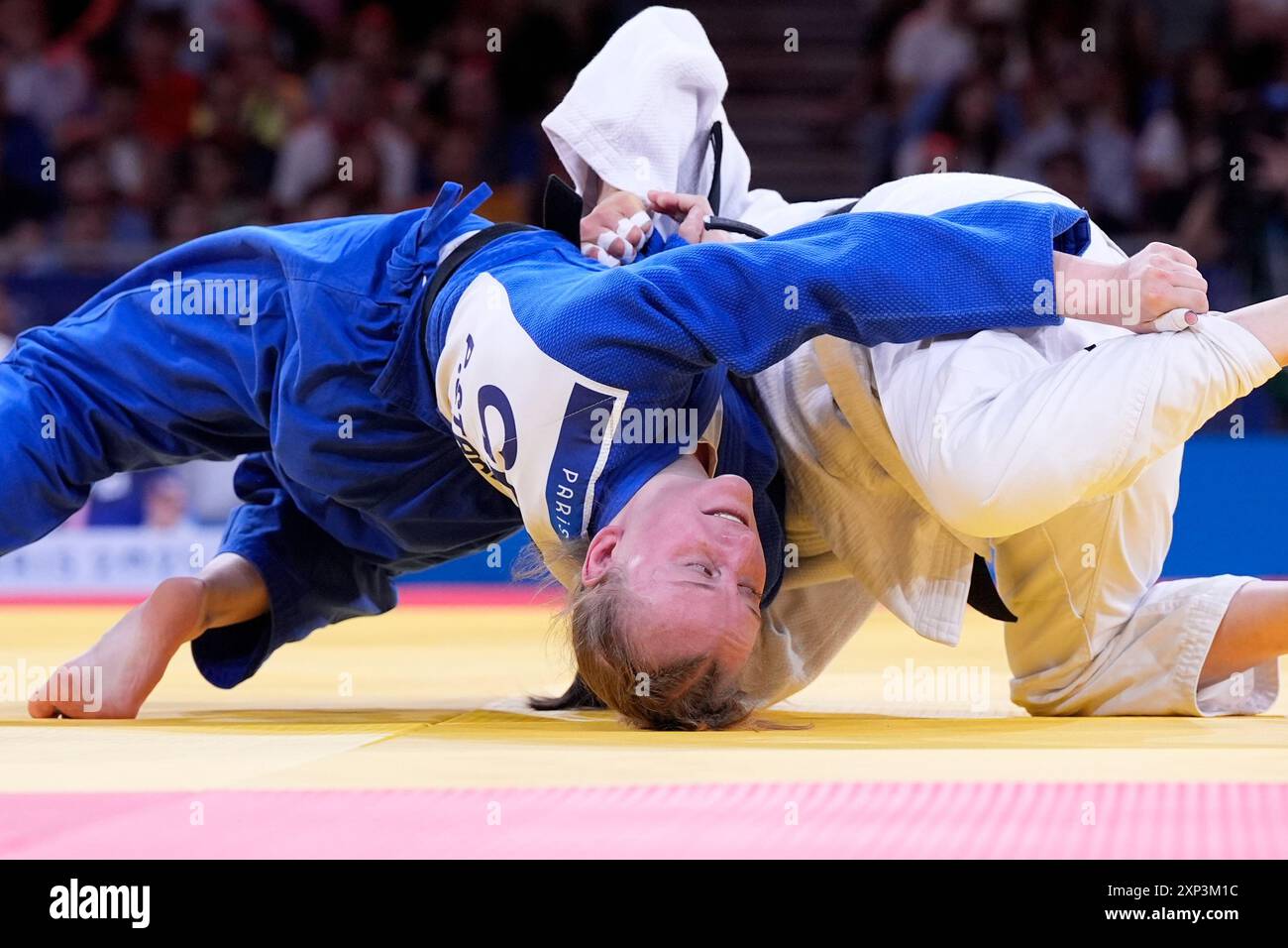 South Korea's Mimi Huh and Germany's Pauline Starke compete during ...