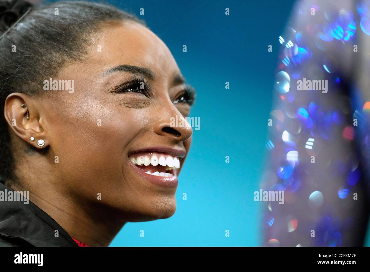 Simone Biles, of the United States, smile during the women's artistic ...