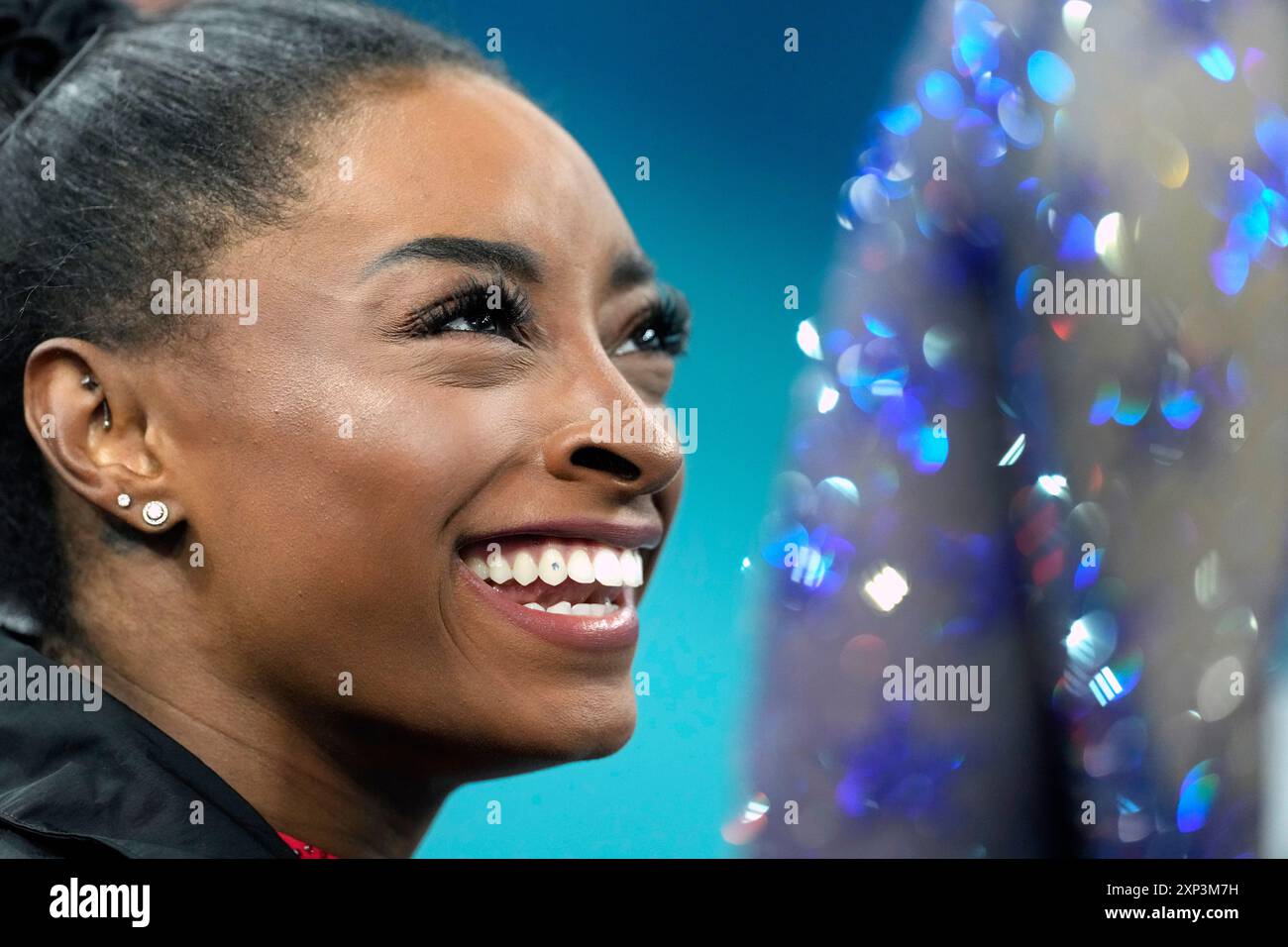 Simone Biles, of the United States, smile during the women's artistic ...