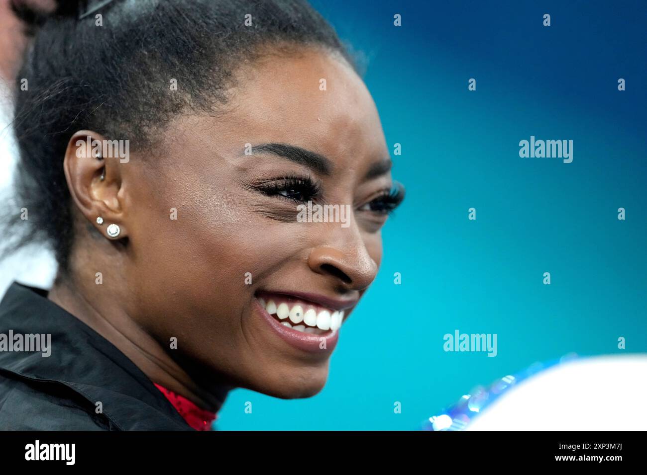 Simone Biles, of the United States, smile during the women's artistic ...