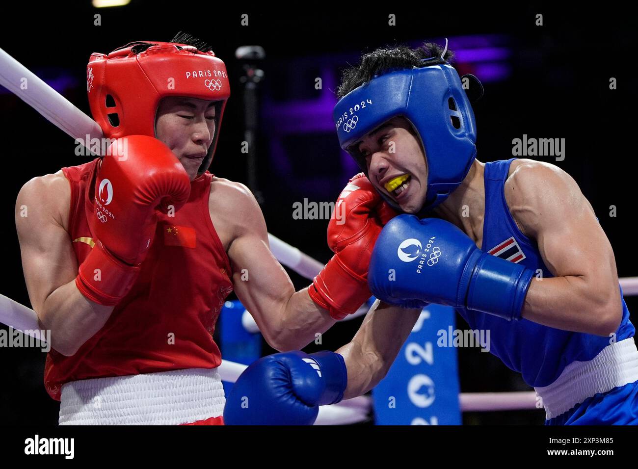 China's Wu Yu, left, fights Thailand's Chuthamat Raksat in there women ...