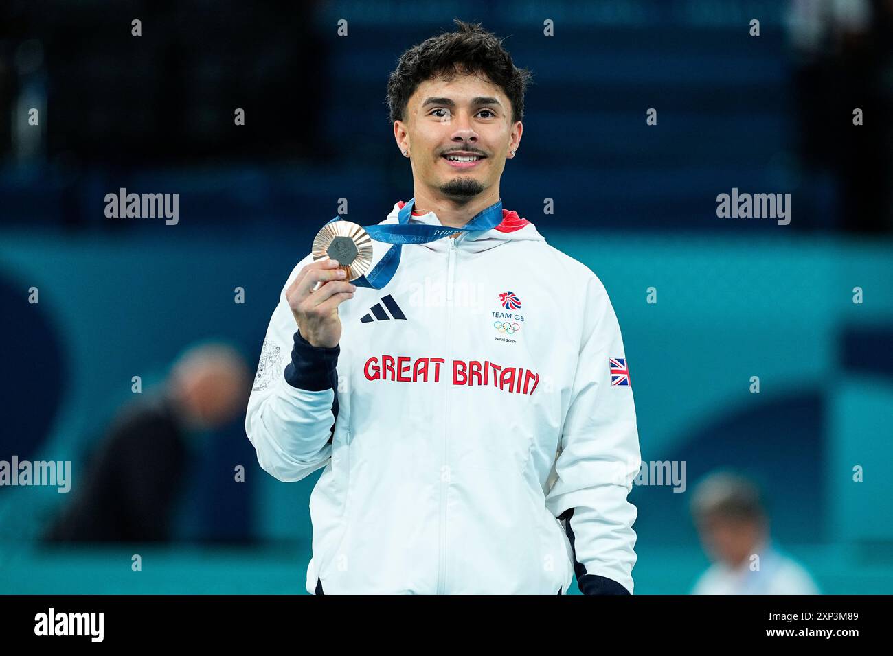 Bronze medalist Jake Jarman of Great Britain pose with his medal on the ...