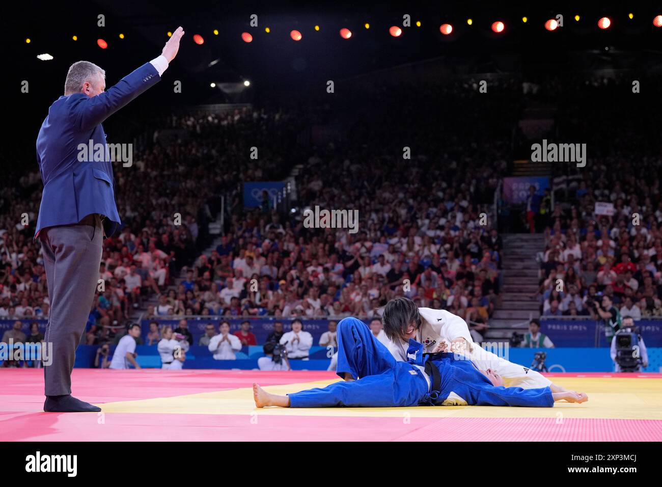 South Korea's Mimi Huh and Germany's Pauline Starke compete during ...