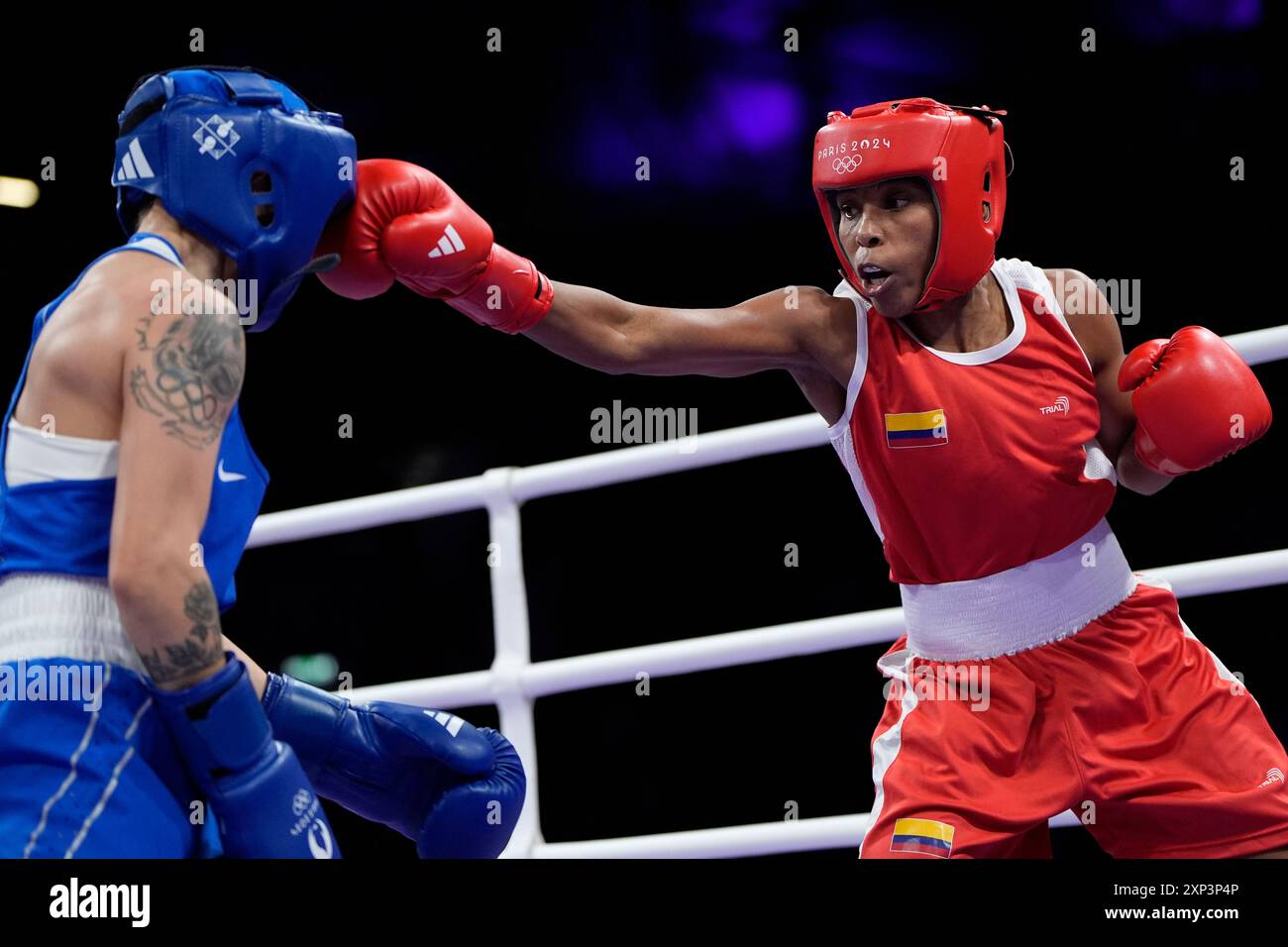 Colombia's Ingrit Valencia fights, right, Kazakhstan's Nazym Kyzaibay ...