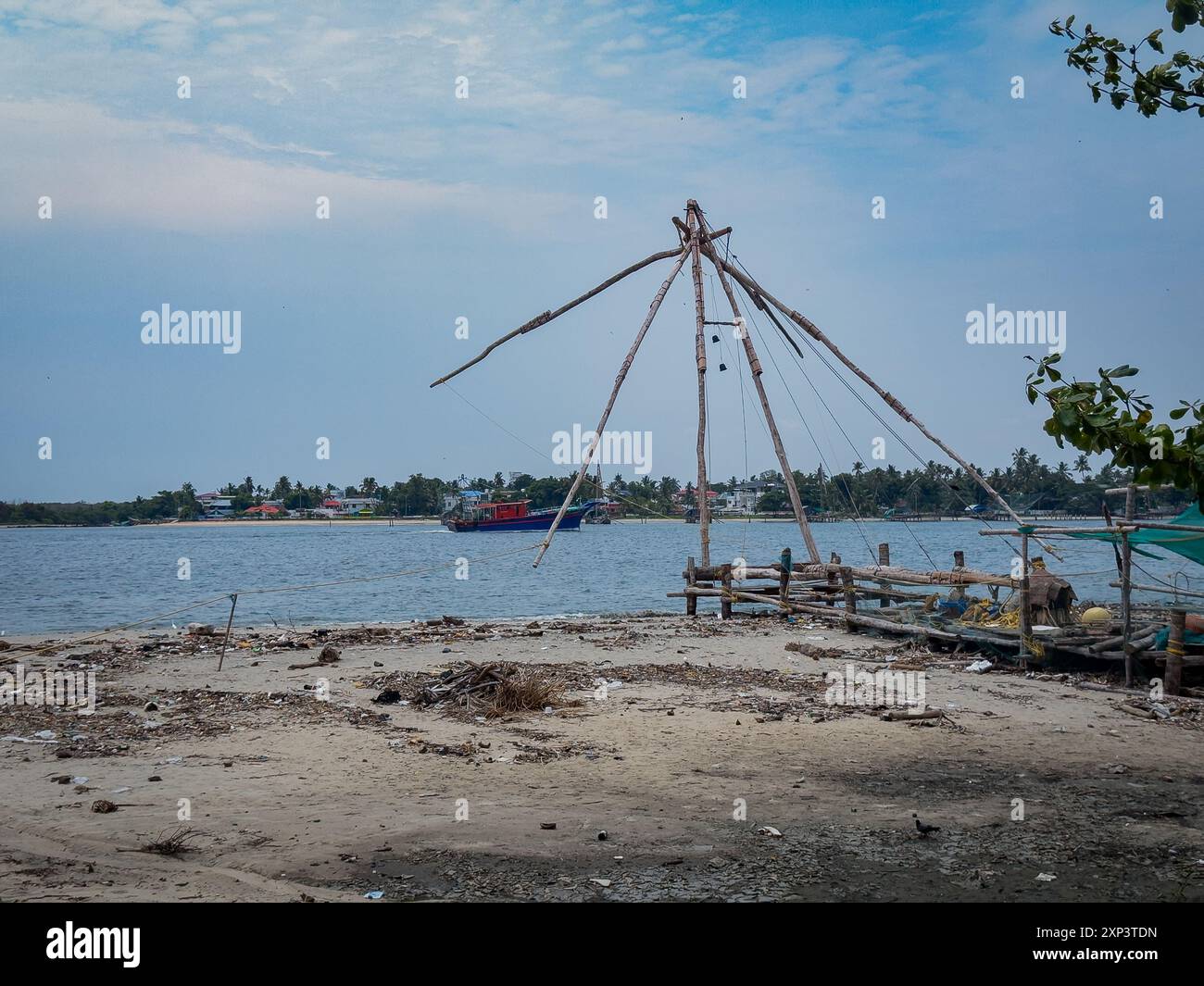 Chinese fishing nets and vessel along the the Promenade of Vasco Da ...