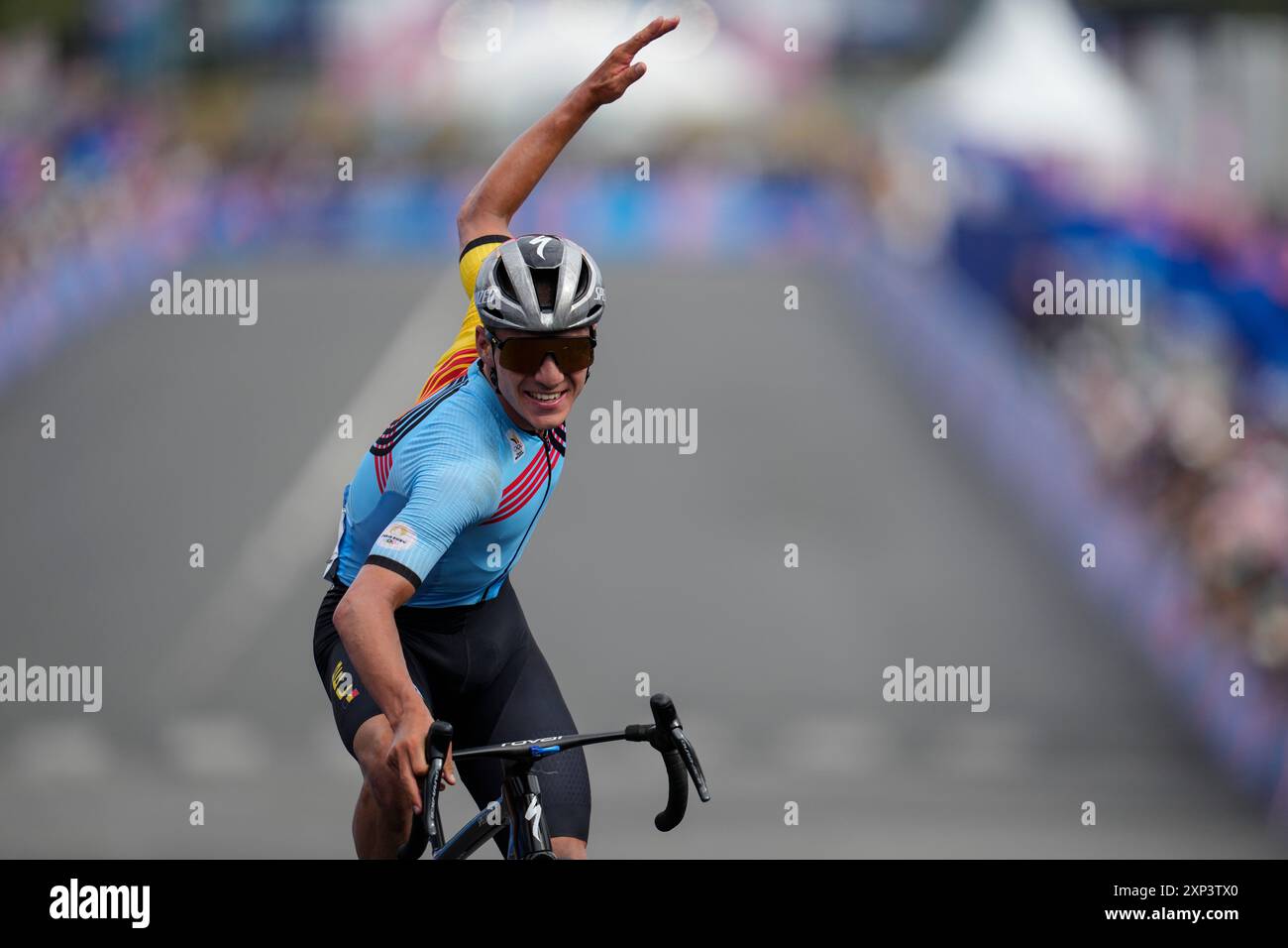 Remco Evenepoel, of Belgium, celebrates winning the men's road cycling ...