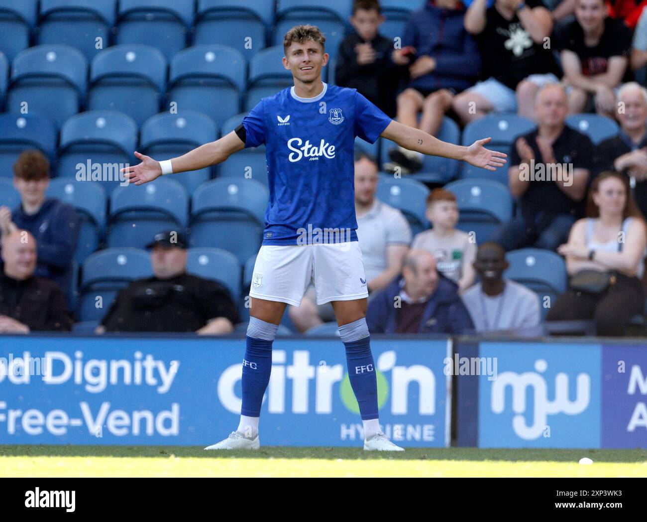 Everton's Jesper Lindstrom celebrates after scoring his free kick ...