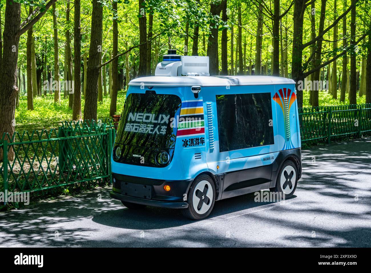 A driverless car selling ice cream in a public park. Beijing, China ...